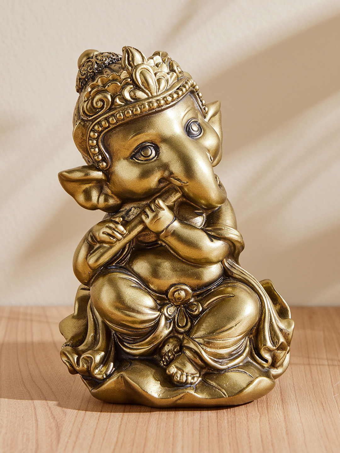 Buy Home Centre Golden Flute Ganesha Idol Showpiece - Showpieces for ...