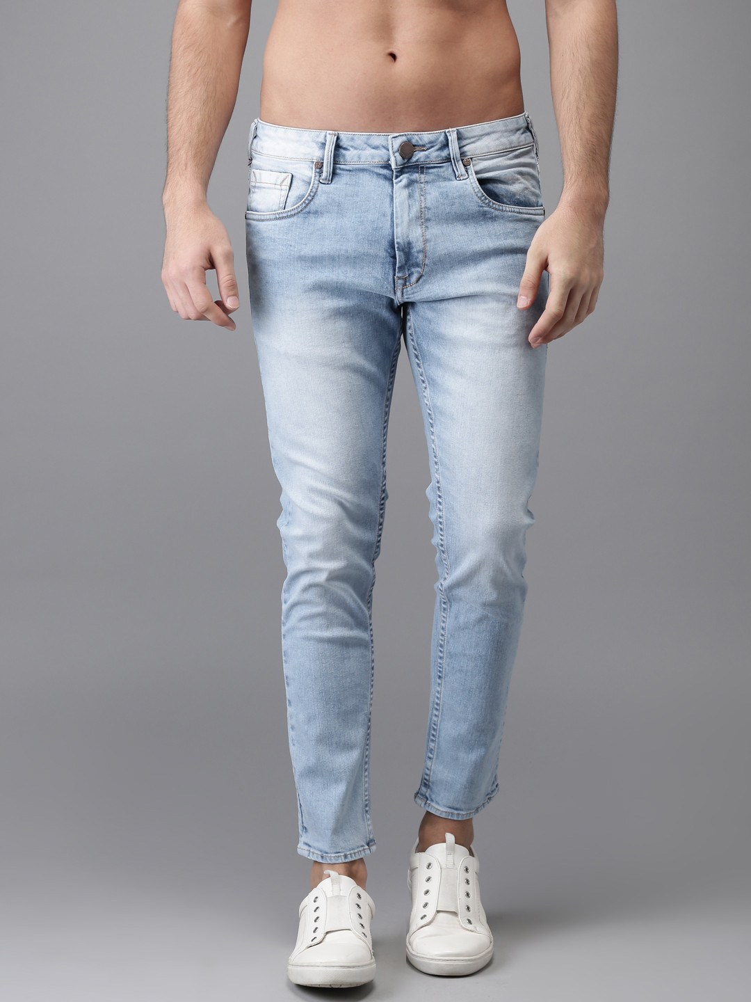 Buy HERE&NOW Men Blue Tapered Fit Mid Rise Clean Look Stretchable ...