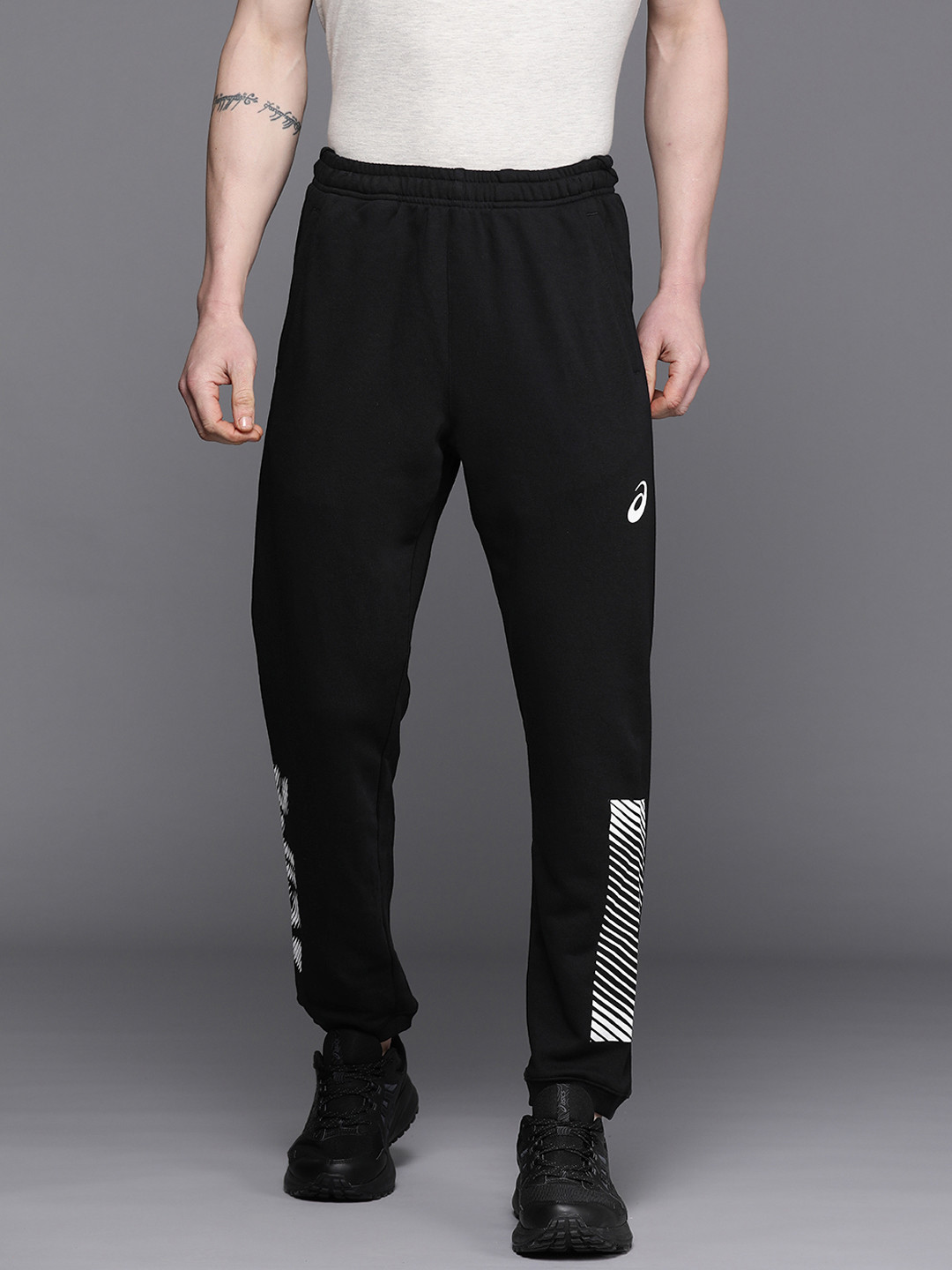 Buy ASICS Men Striped & Brand Logo Printed Mid Rise Training Joggers ...