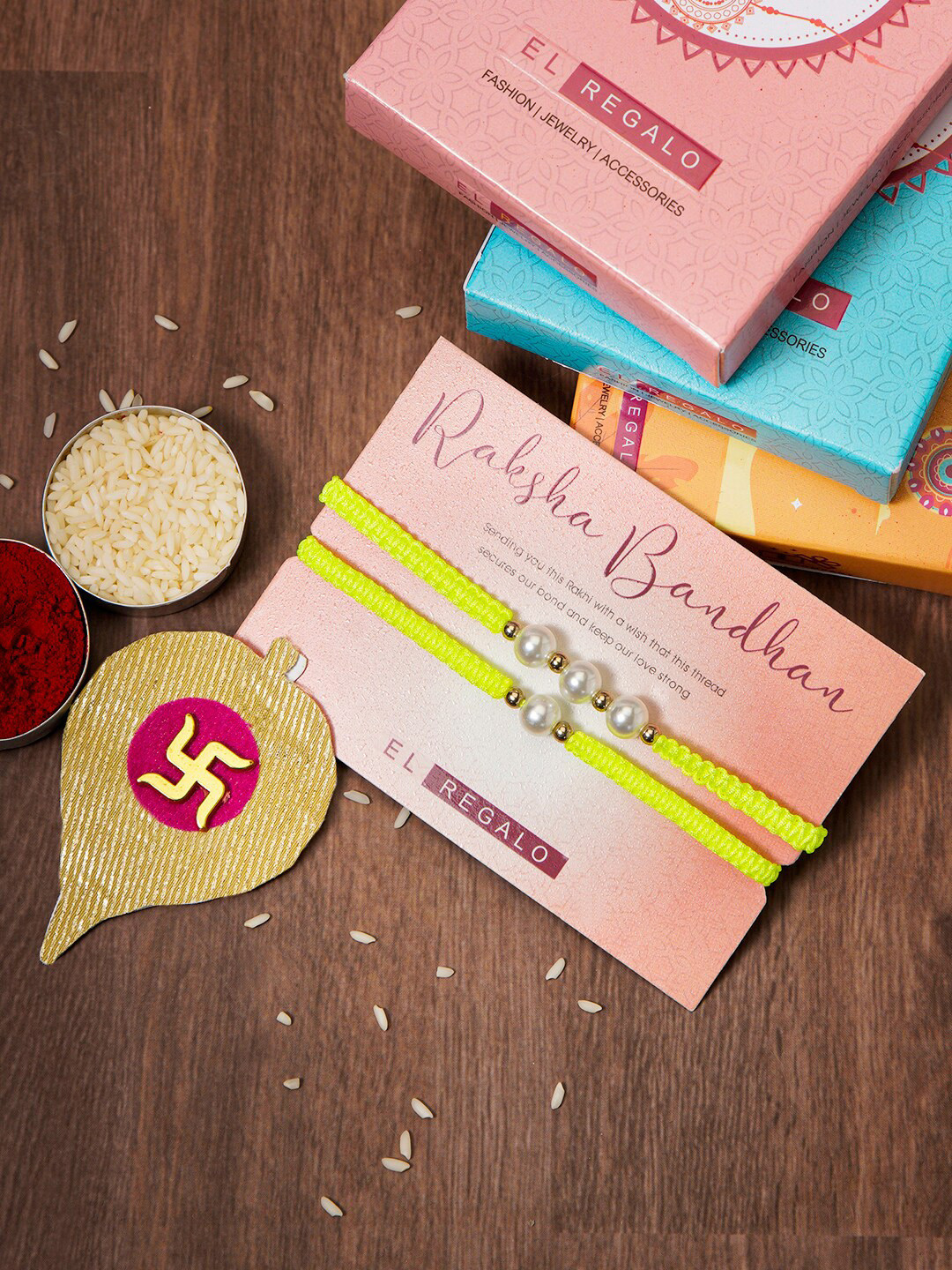 Buy EL REGALO Set Of 2 Pearl Bhaiya And Bhabhi Rakhi With Roli Rice ...