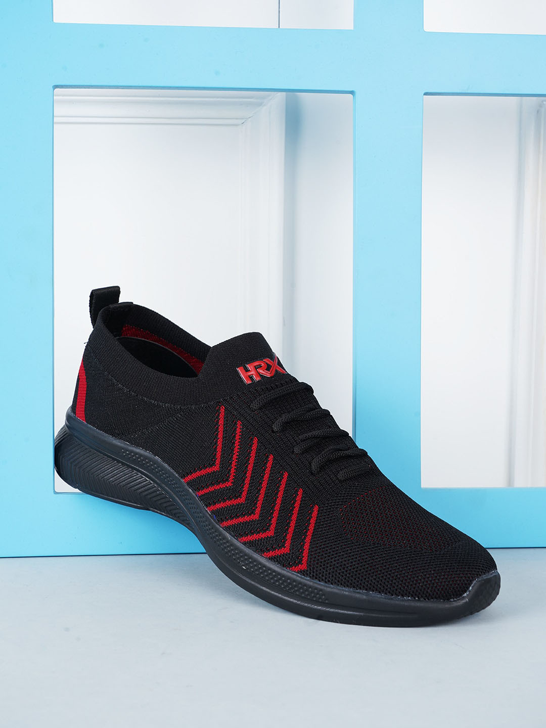 Buy HRX By Hrithik Roshan Men Black & Red Striped Contrast Sole Slip On ...