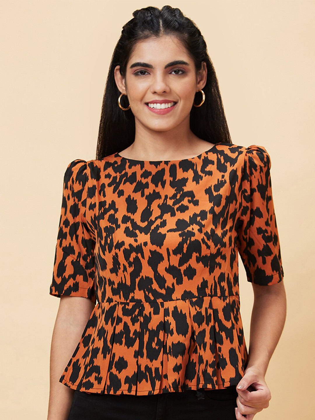 Buy Globus Animal Print Puff Sleeves Pleated Peplum Top - Tops for ...