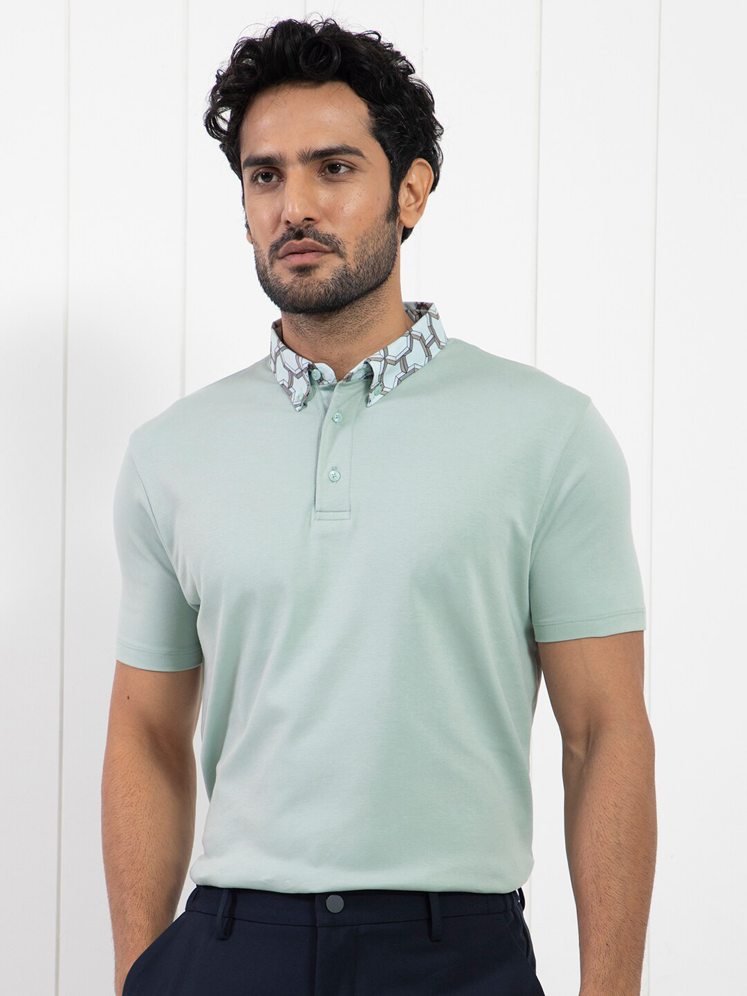 Buy RARE RABBIT Men Rings 4 Slim Fit Solid Polo Collar T Shirt ...