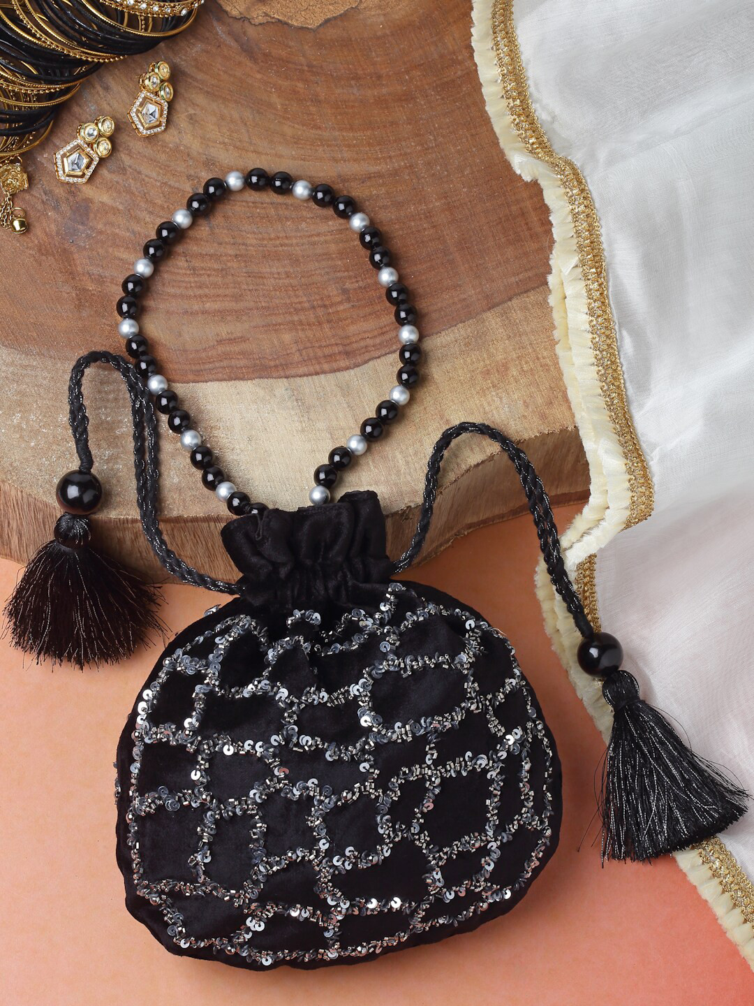 Buy Anekaant Embellished Wrist Loop Tasselled Potli Clutch - Clutches ...