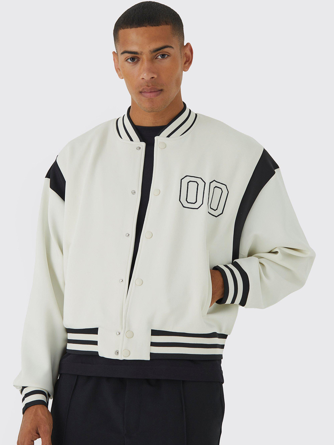 Buy BoohooMAN Solid Stand Collar Typography Embroidered Varsity Jacket ...