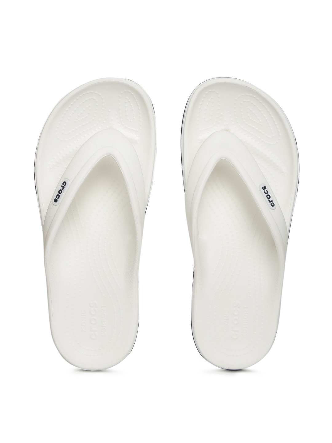 Buy Crocs Unisex White Solid Clogs - Flip Flops for Unisex 2453543 | Myntra