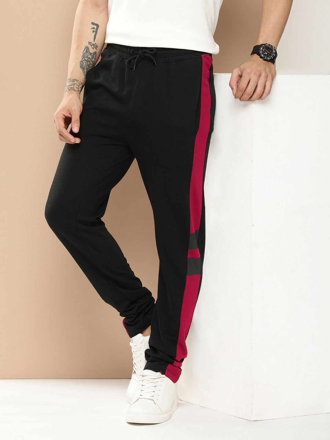 Buy INVICTUS Men Solid Regular Fit Mid Rise Knitted Track Pants With ...