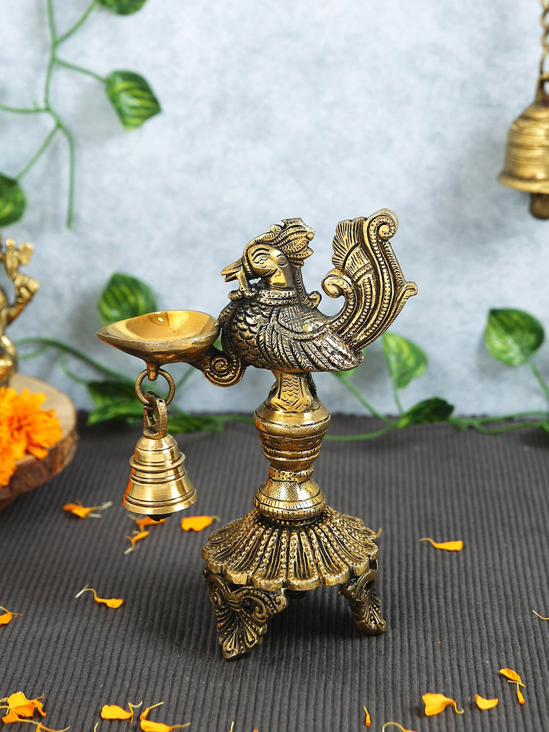 Buy Imli Street Gold Toned Peacock Designed Brass Diya Lamp With Bell ...