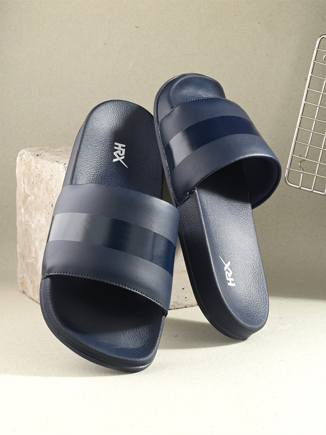 Buy HRX By Hrithik Roshan Men Navy Blue & White Solid Sliders - Flip ...