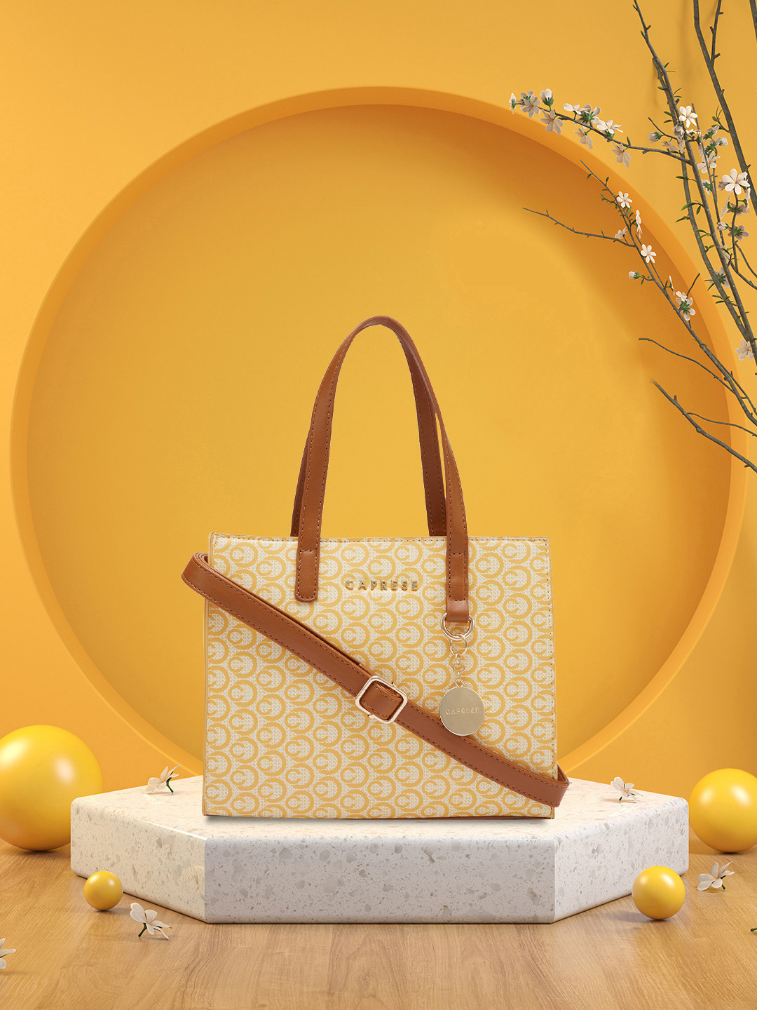 Buy Caprese Brand Logo Printed Leather Structured Handheld Bag ...