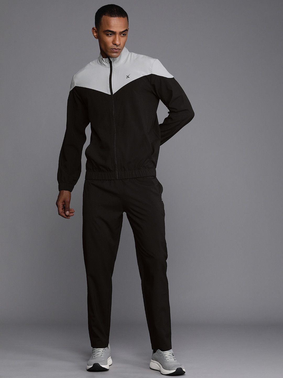 Buy HRX By Hrithik Roshan Men Colourblocked Rapid Dry Tracksuits ...