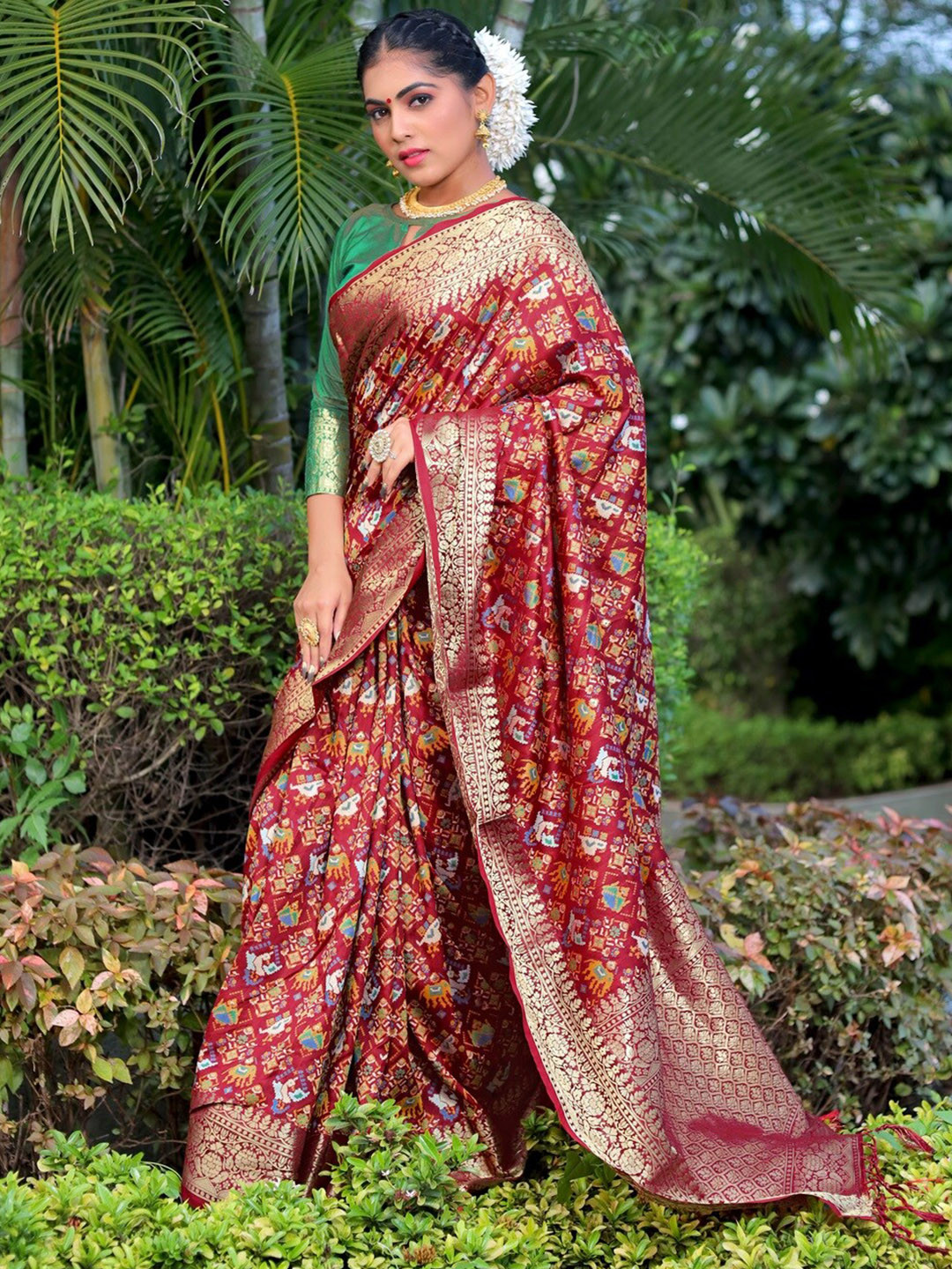 Buy Anouk Maroon Ethnic Motifs Woven Design Pure Silk Patola Saree ...