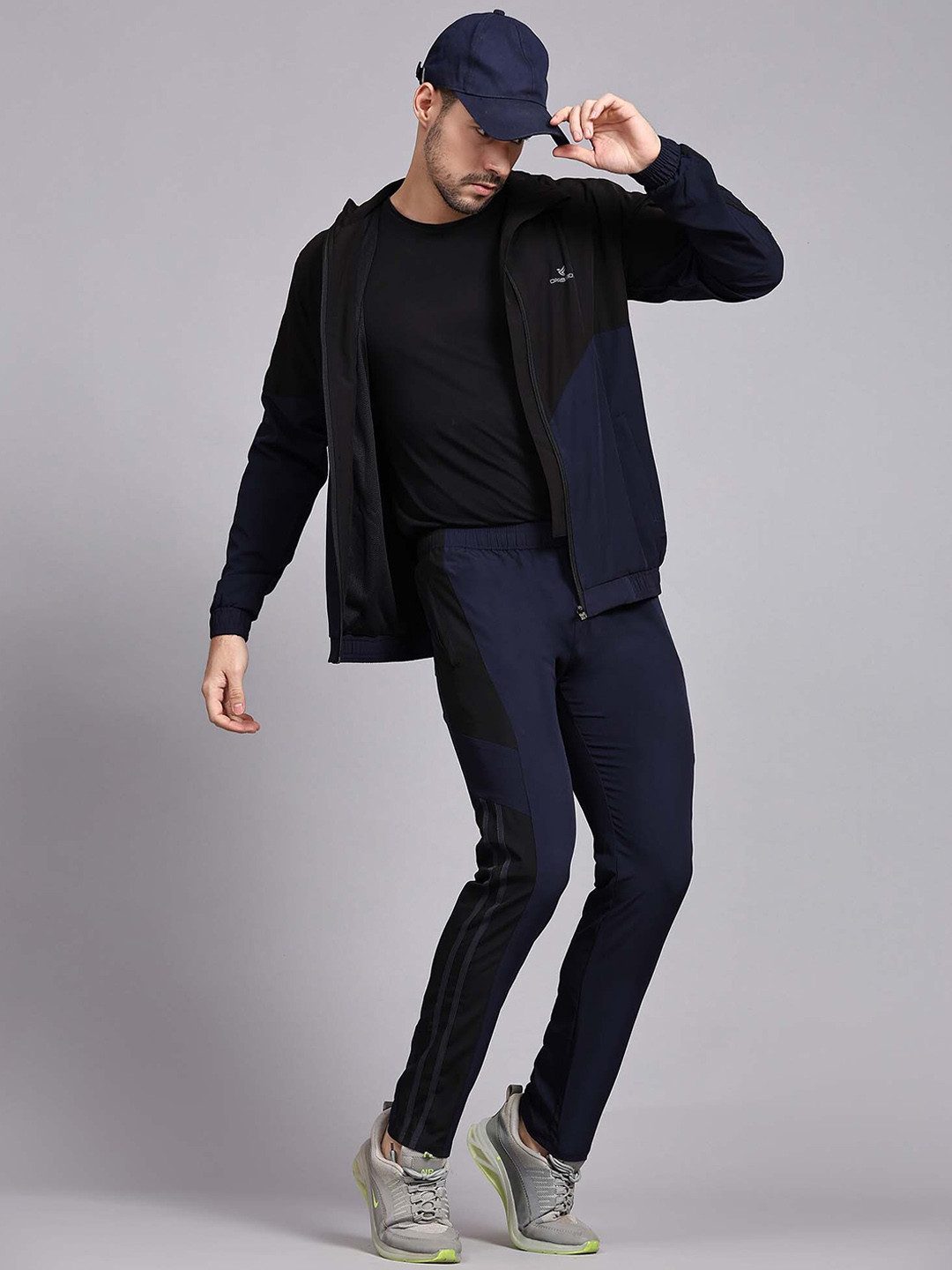 Buy Dpassion Colourblocked Mock Collar Jacket & Mid Rise Track Pant ...