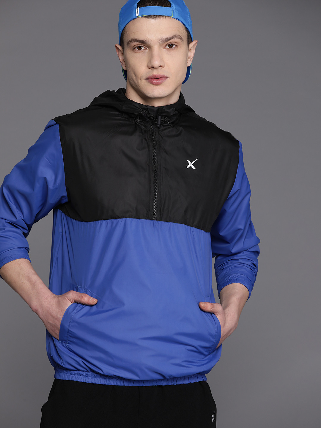 Buy HRX By Hrithik Roshan Men Colourblocked Windcheater Running Sporty ...