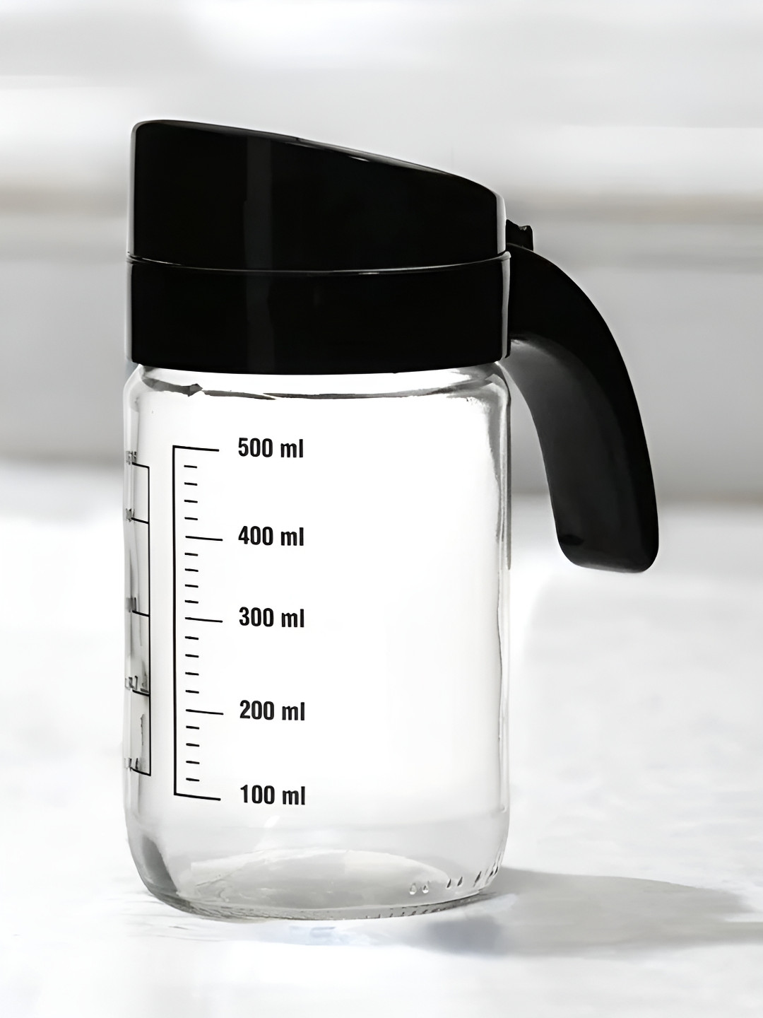 Buy Athome By Nilkamal Transparent Black Glass Oil Measure Jar With Lid ...
