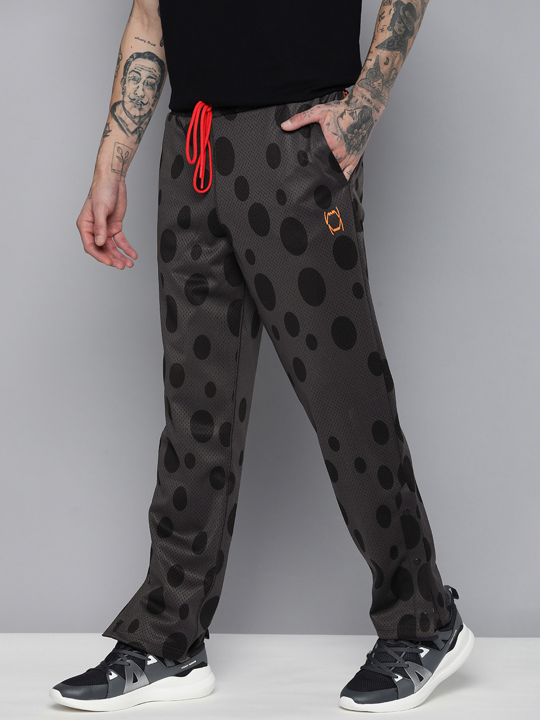 Buy Puma Men HOOPS X Cheetos Mid Rise Printed Track Pants - Track Pants ...