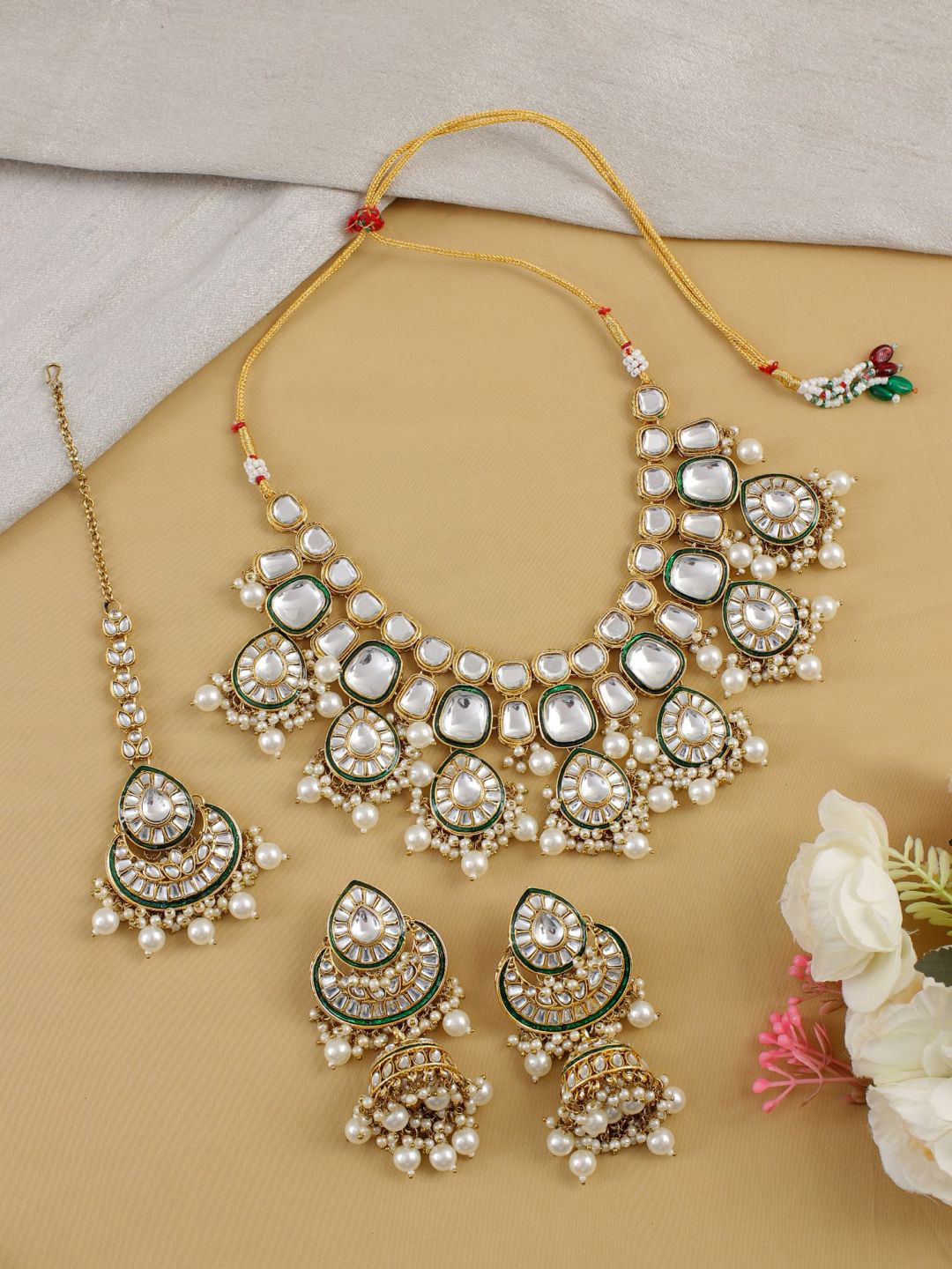 Buy SwaDev Gold Plated Kundan Studded & Pearls Beaded Jewellery Set ...