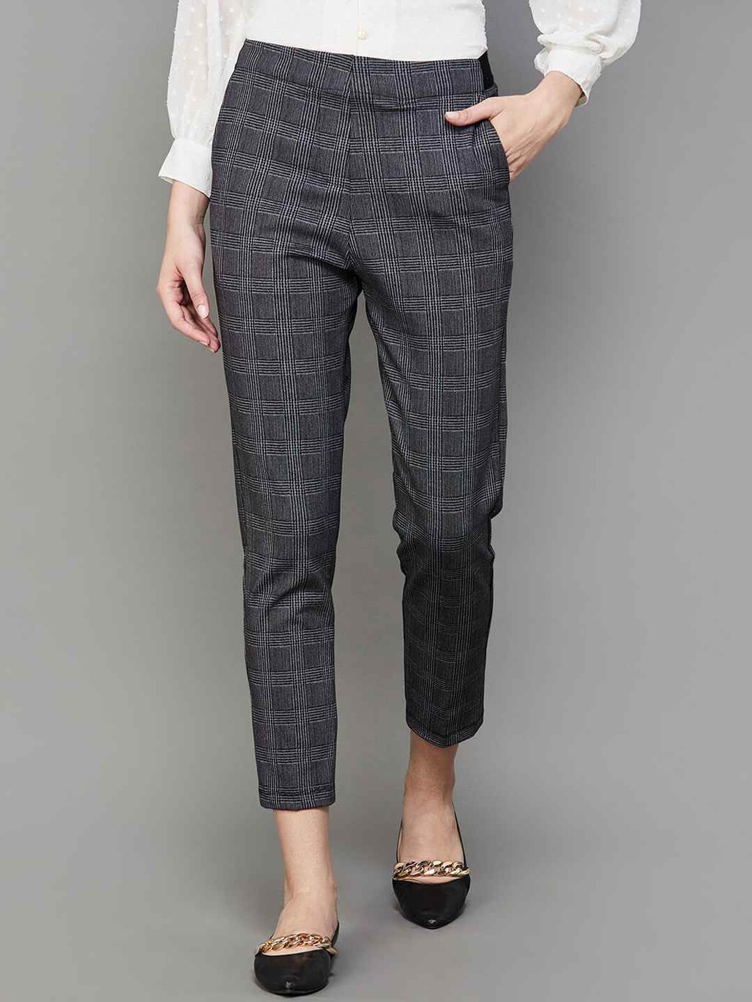 Buy CODE By Lifestyle Women Regular Fit Mid Rise Checked Plain Trousers ...