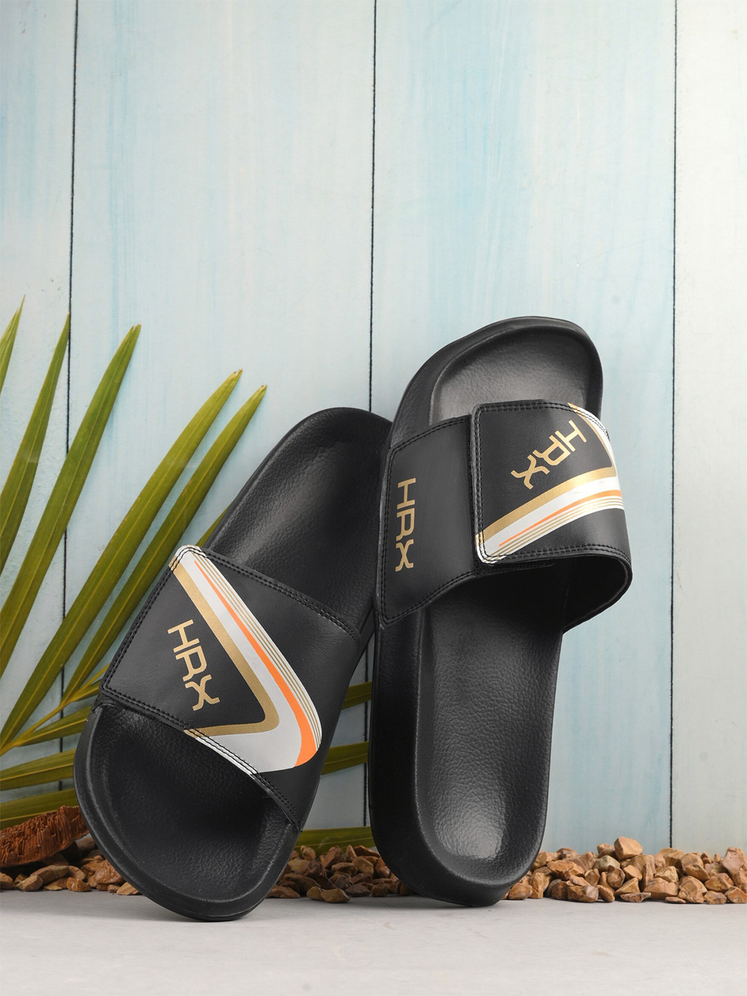 Buy HRX By Hrithik Roshan Men Black Printed Sliders - Flip Flops for ...