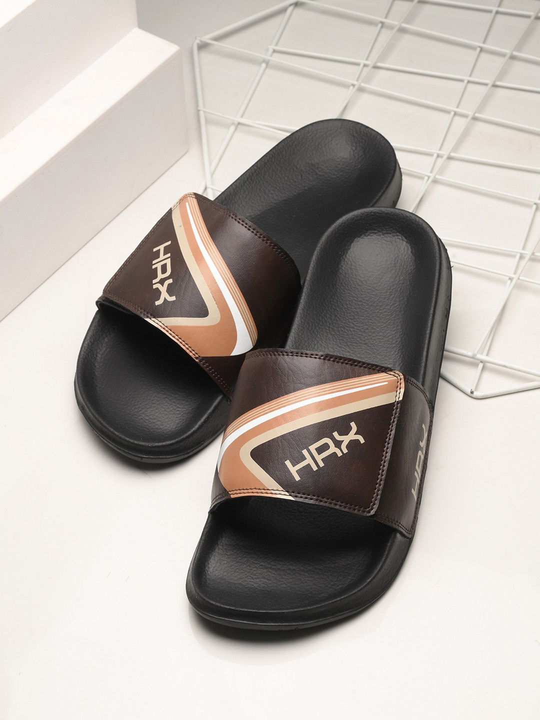 Buy HRX By Hrithik Roshan Men Brown Printed Sliders - Flip Flops for ...