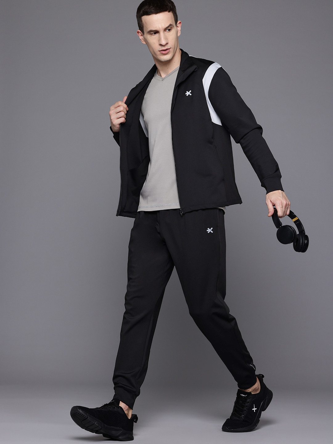 Buy HRX By Hrithik Roshan Men Colourblocked Rapid Dry Tracksuit ...
