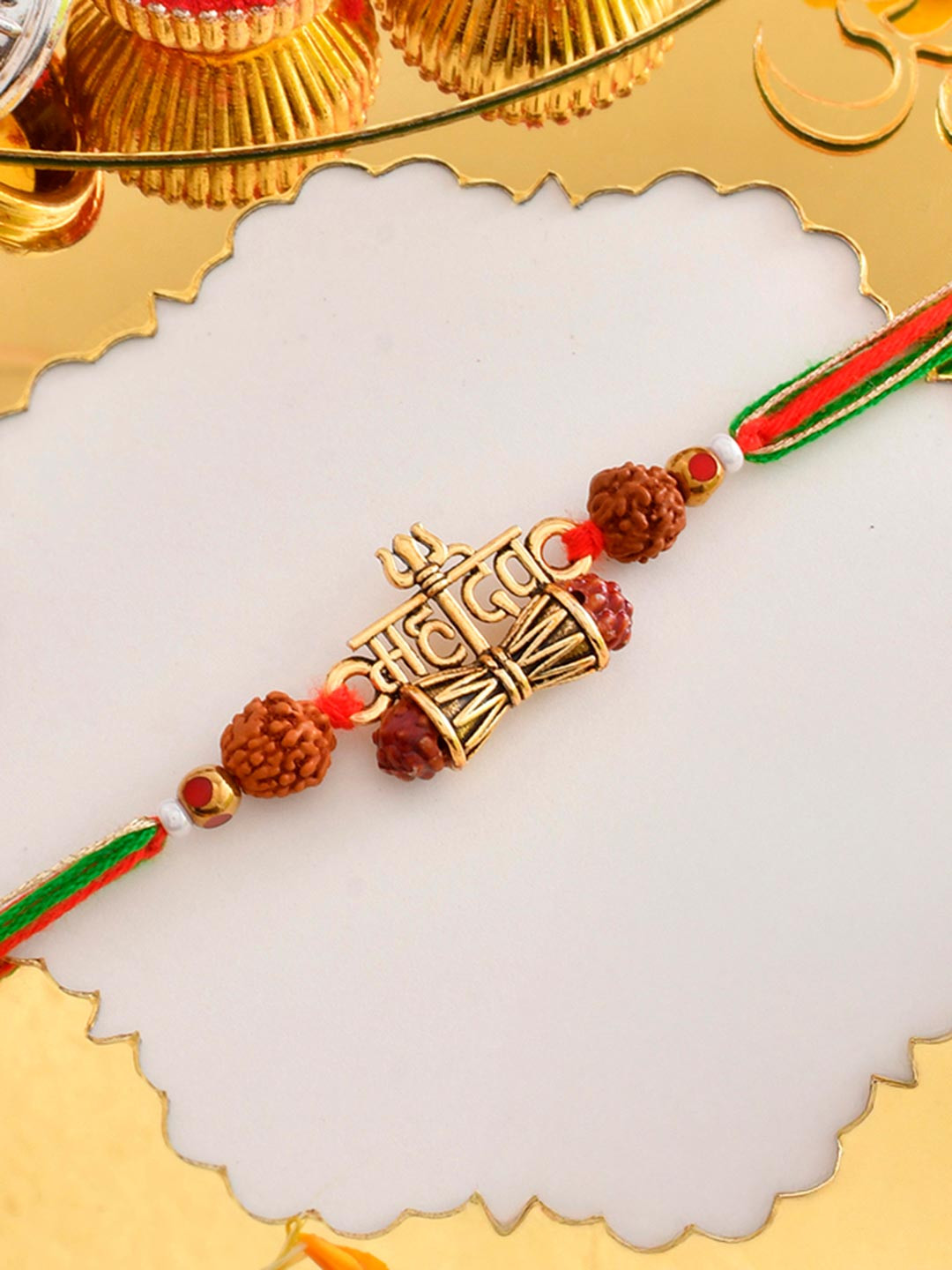 Buy Voylla Men Lord Shiva Damru Motif Thread Rakhi - Rakhi for Men ...