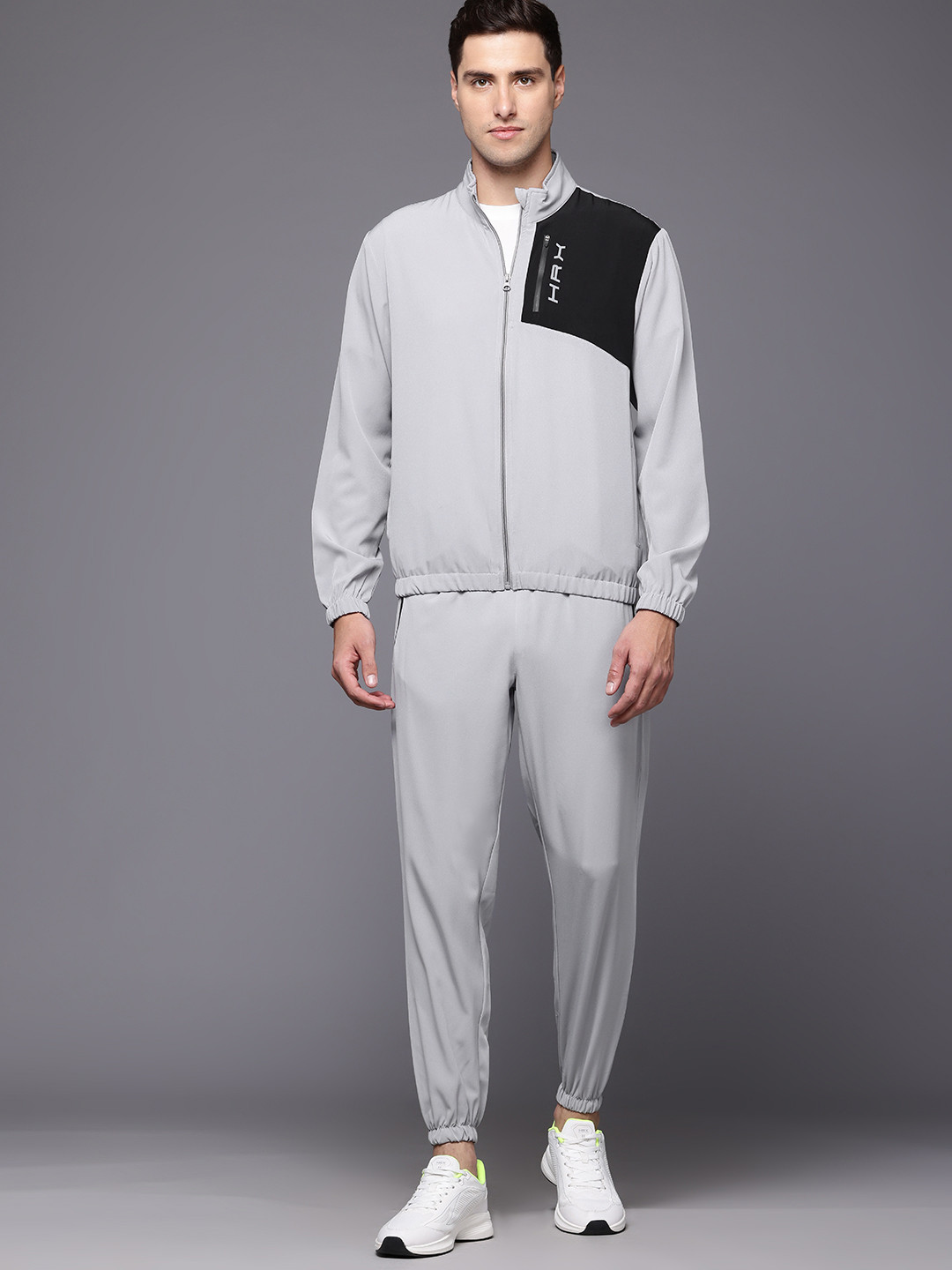 Buy HRX By Hrithik Roshan Men Colourblock Running Track Suit ...