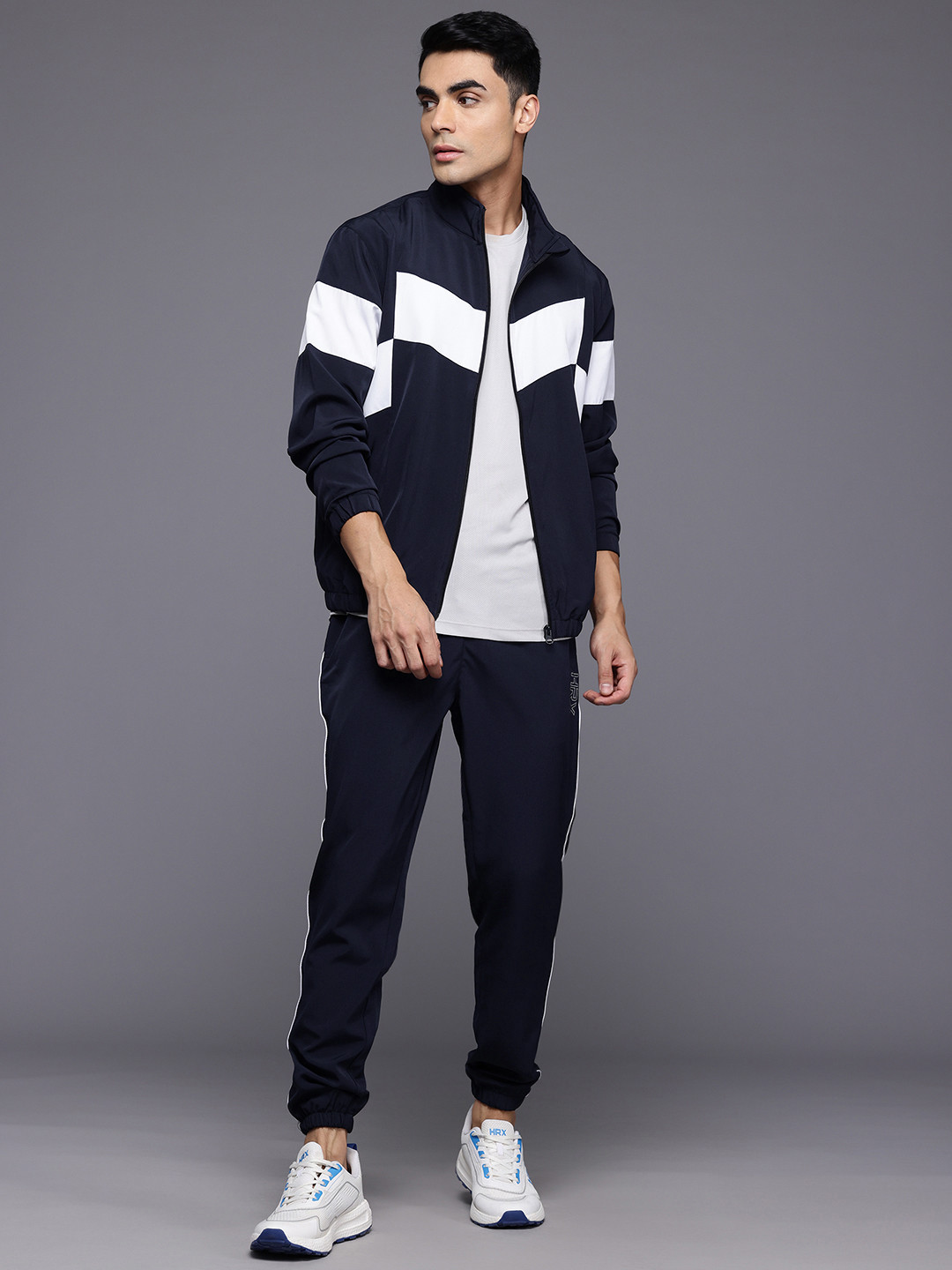 Buy HRX By Hrithik Roshan Striped Rapid Dry Running Tracksuit ...