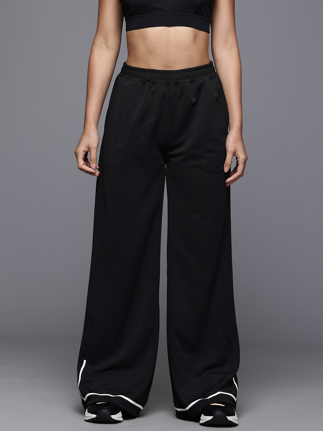 Buy HRX By Hrithik Roshan Women Rapid Dry Training Flared Track Pants ...
