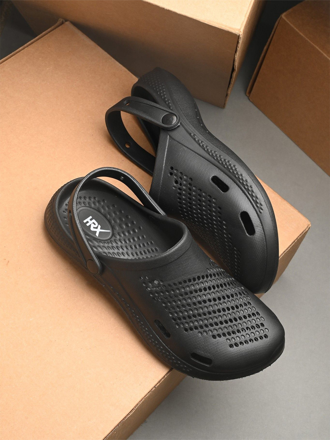 Buy HRX By Hrithik Roshan Men Black Self Design Rubber Clogs - Flip ...