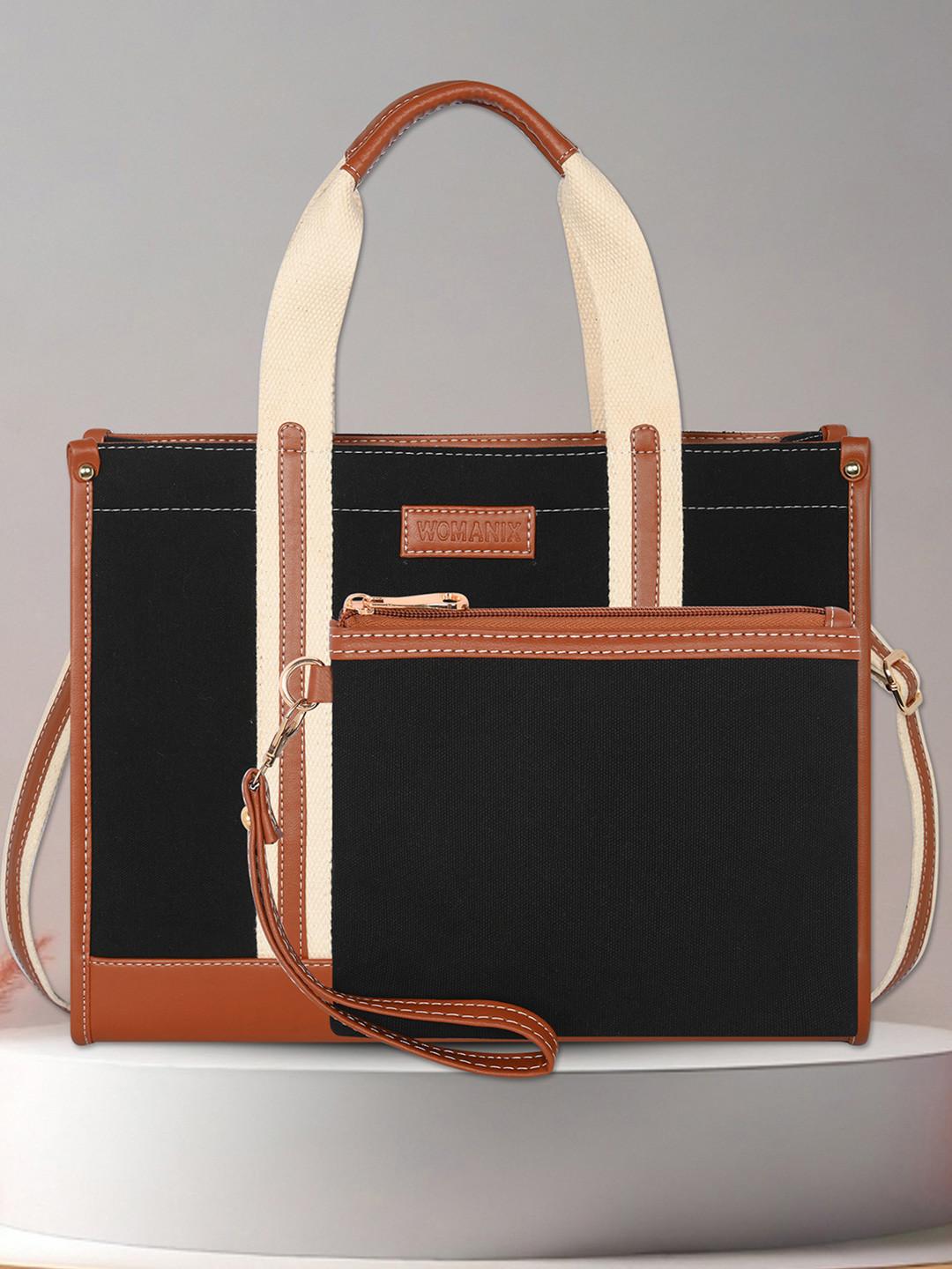 Buy Womanix Colourblocked Structured Handheld Bag With Applique ...