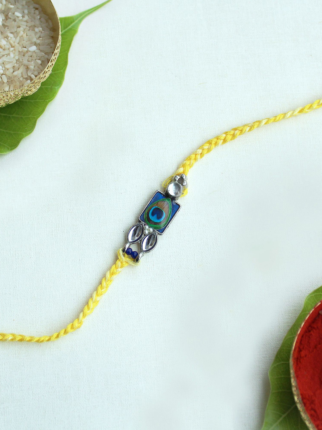 Buy BeAbhika Mor Pankh Vivid Vintage Rakhi With Roli Chawal Capsules ...