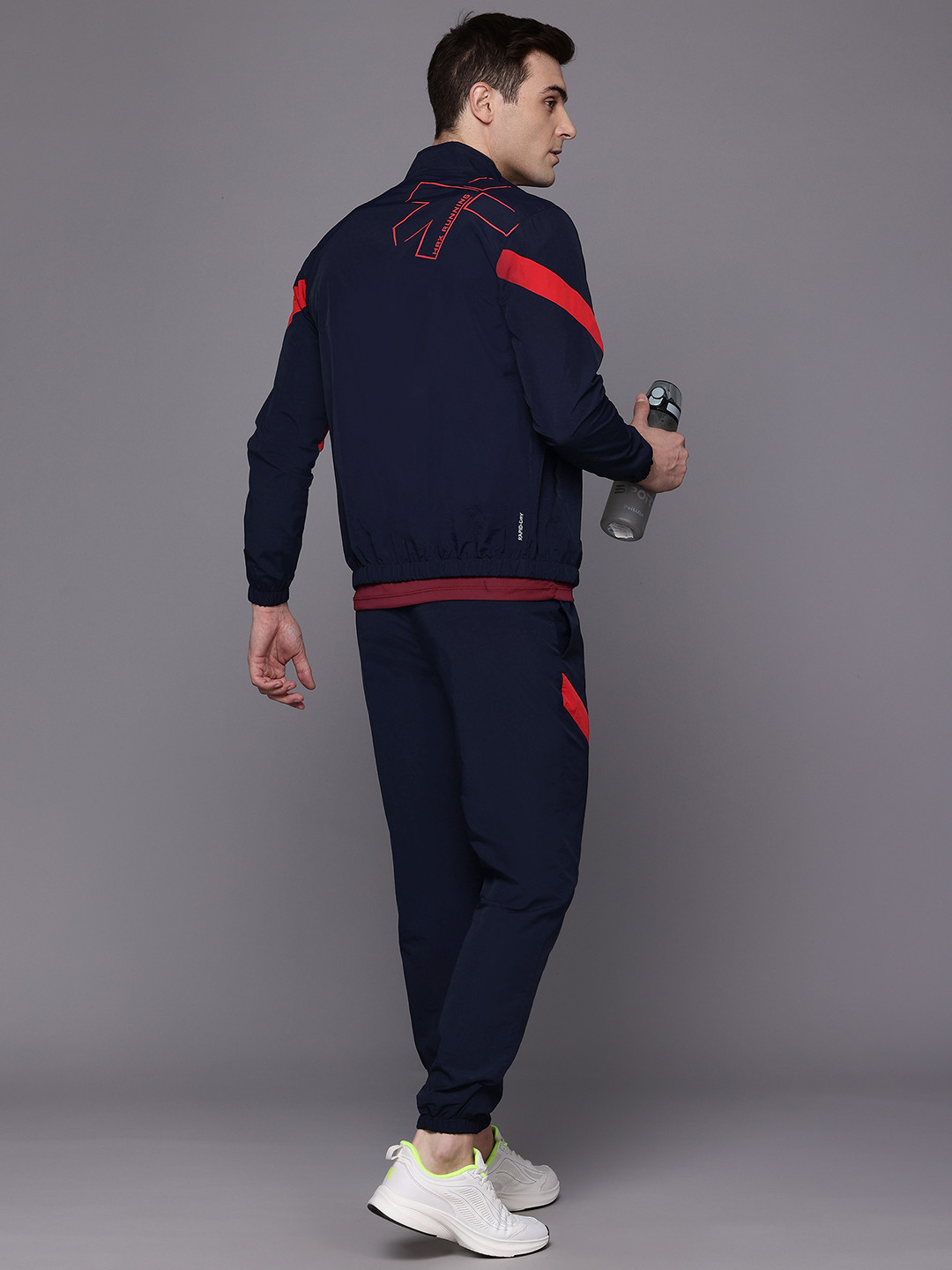 Buy HRX By Hrithik Roshan Printed Running Tracksuit - Tracksuits for ...