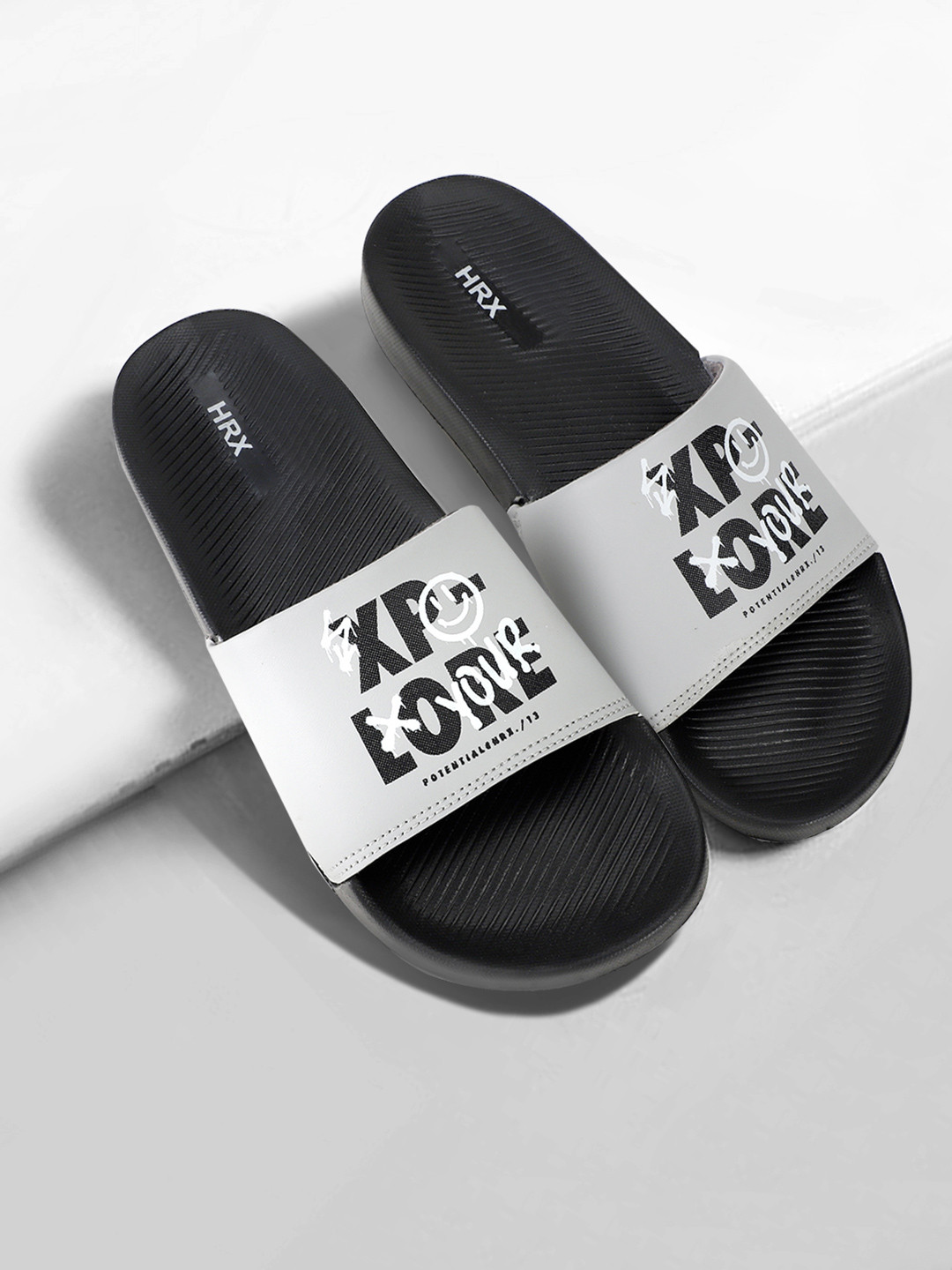 Buy HRX By Hrithik Roshan Men Printed Sliders - Flip Flops for Men ...