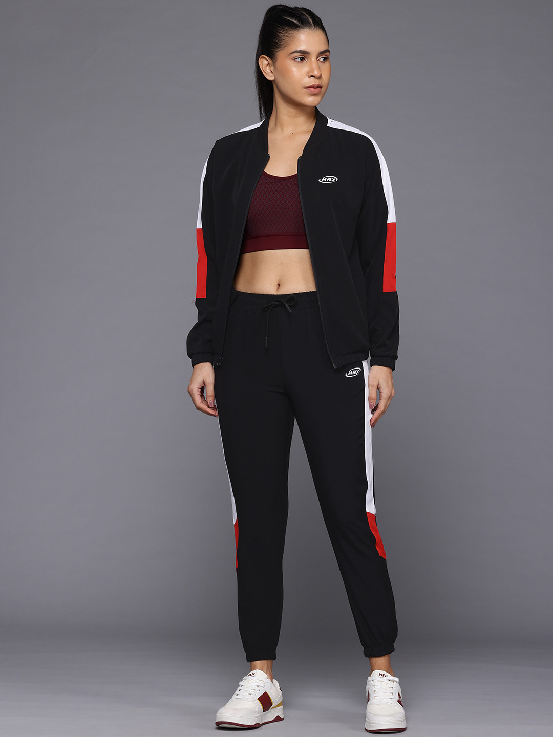 Buy HRX By Hrithik Roshan Colourblocked Lifestyle Zip Up Tracksuit ...