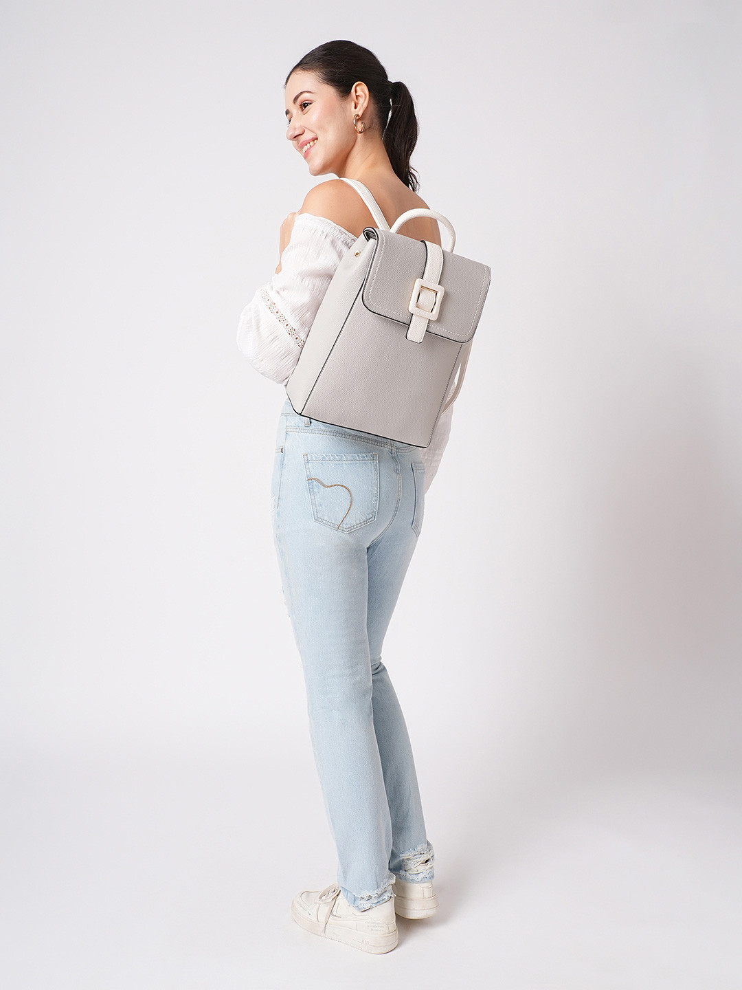 Buy Globus Women Solid Buckle Detail Yoke Style Strap Medium Backpack ...