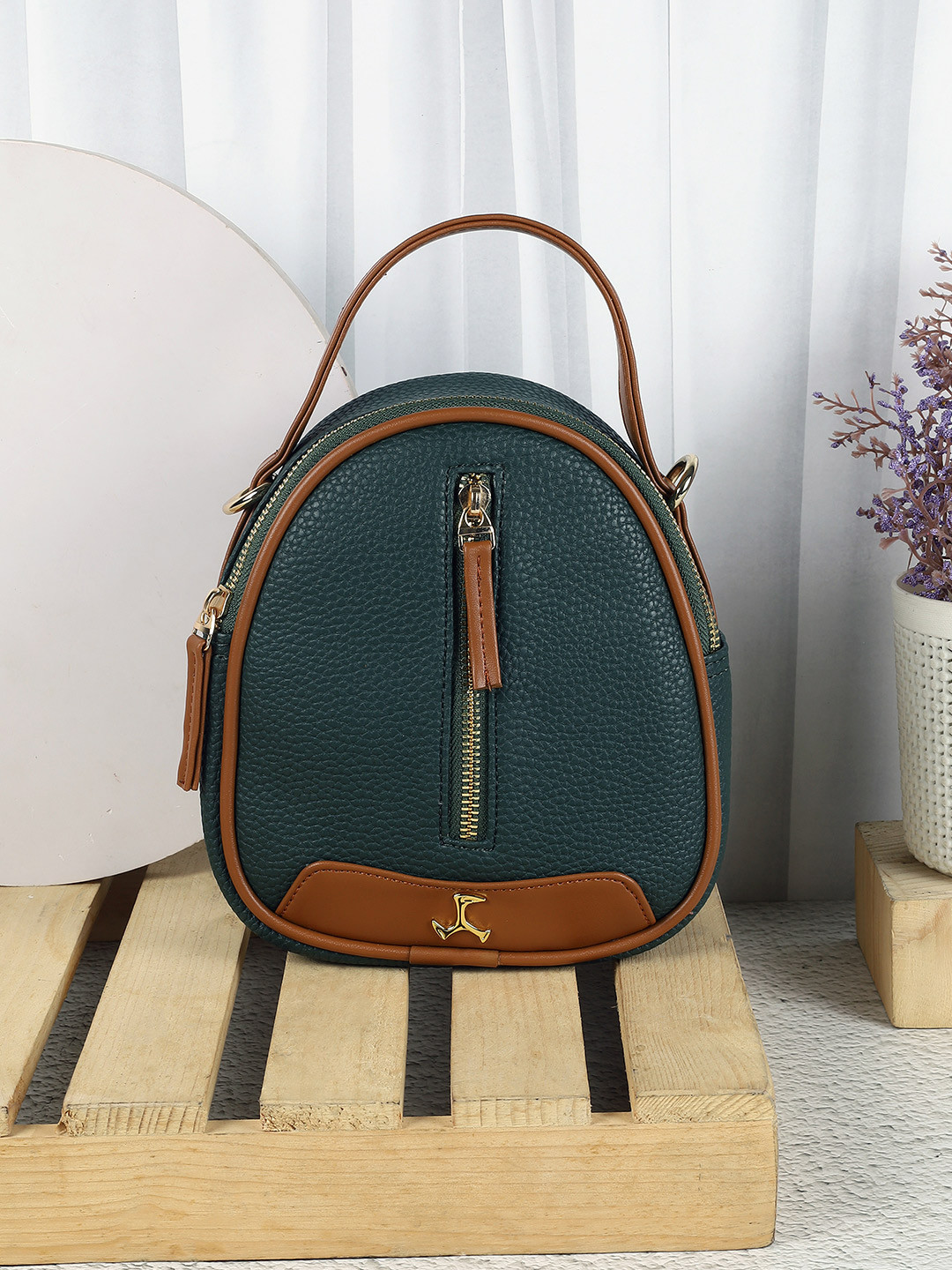 Buy Mochi Textured Sling Bag - Handbags for Women 31164098 | Myntra