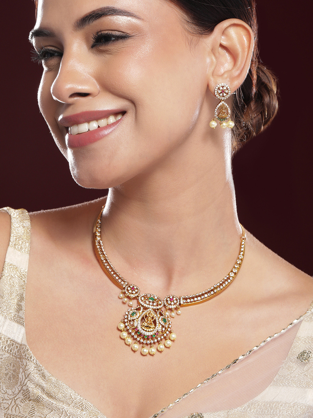 Buy Rubans 22K Gold Plated Emerald Green, Ruby Pink & White Cubic Zirconia Temple Necklace Set ...