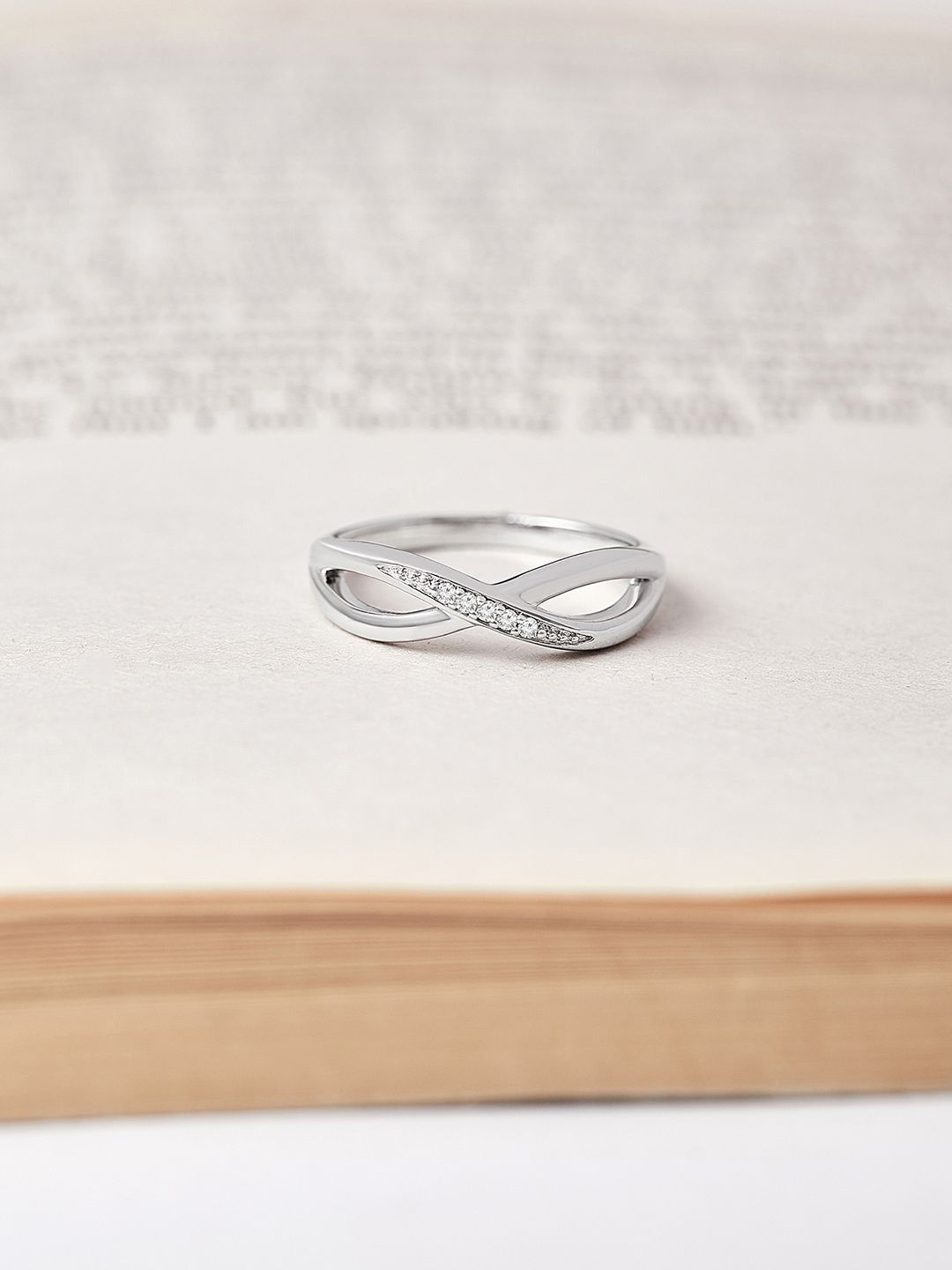 Buy Mia By Tanishq 92.5 Sterling Silver Plated Cubic Zirconia Sparkling Infinity Finger Ring ...