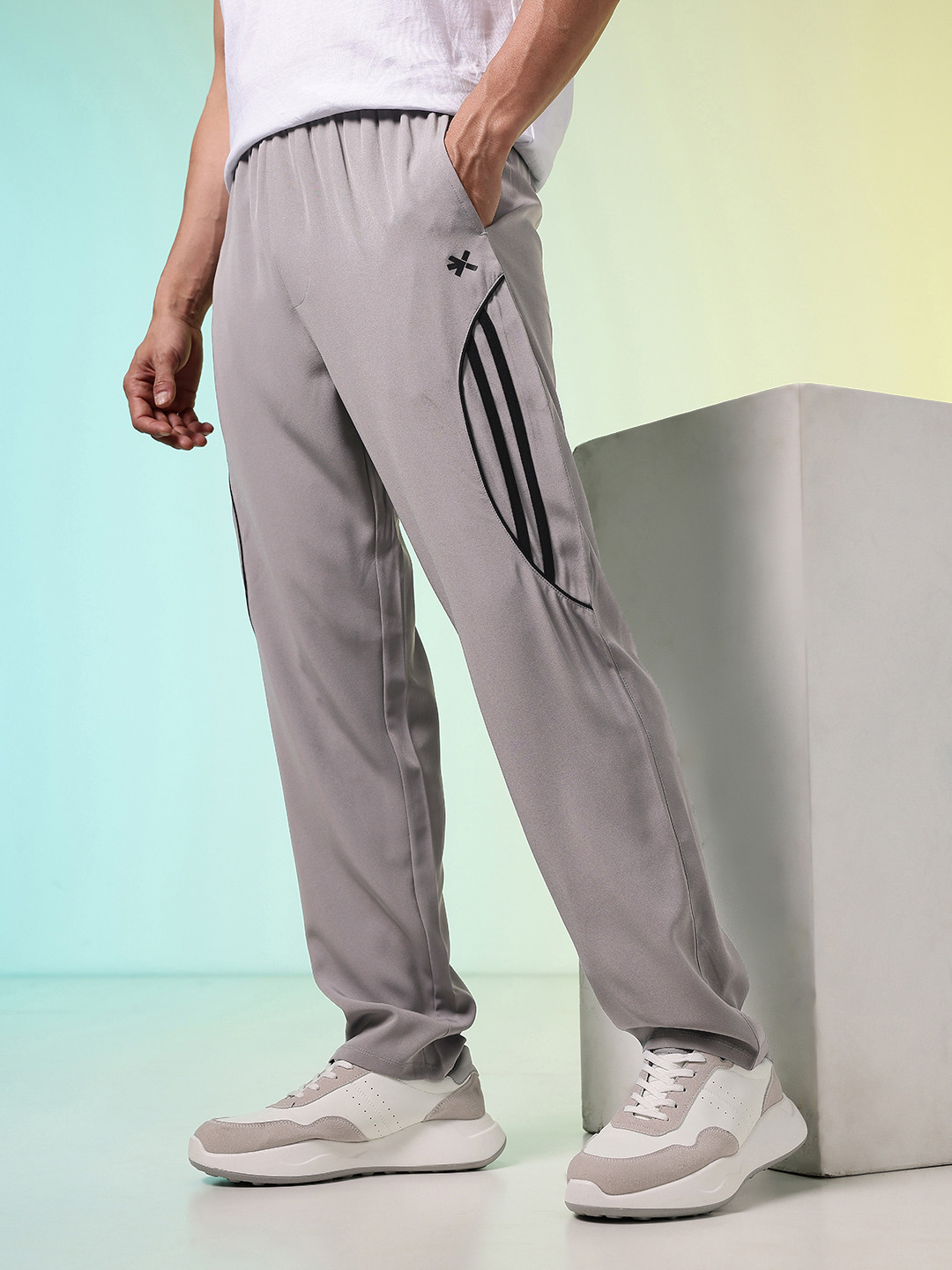 Buy HRX By Hrithik Roshan Men Lifestyle Striped Rapid Dry Track Pants ...