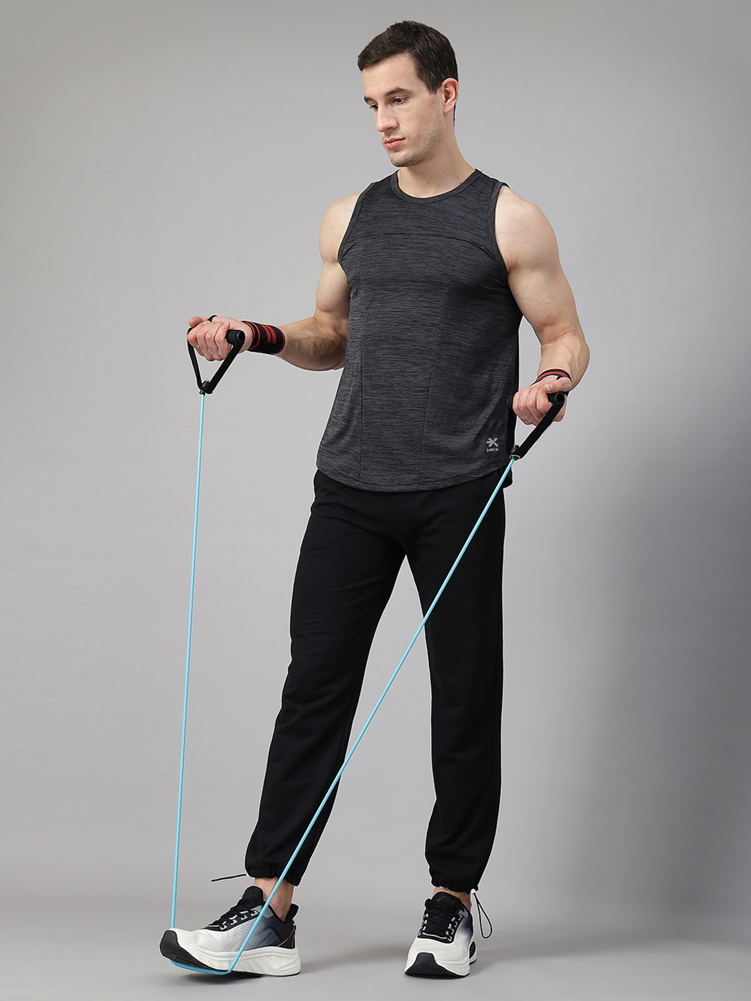 Buy HRX By Hrithik Roshan Men Solid Slim Fit Round Neck Sport Vest T ...