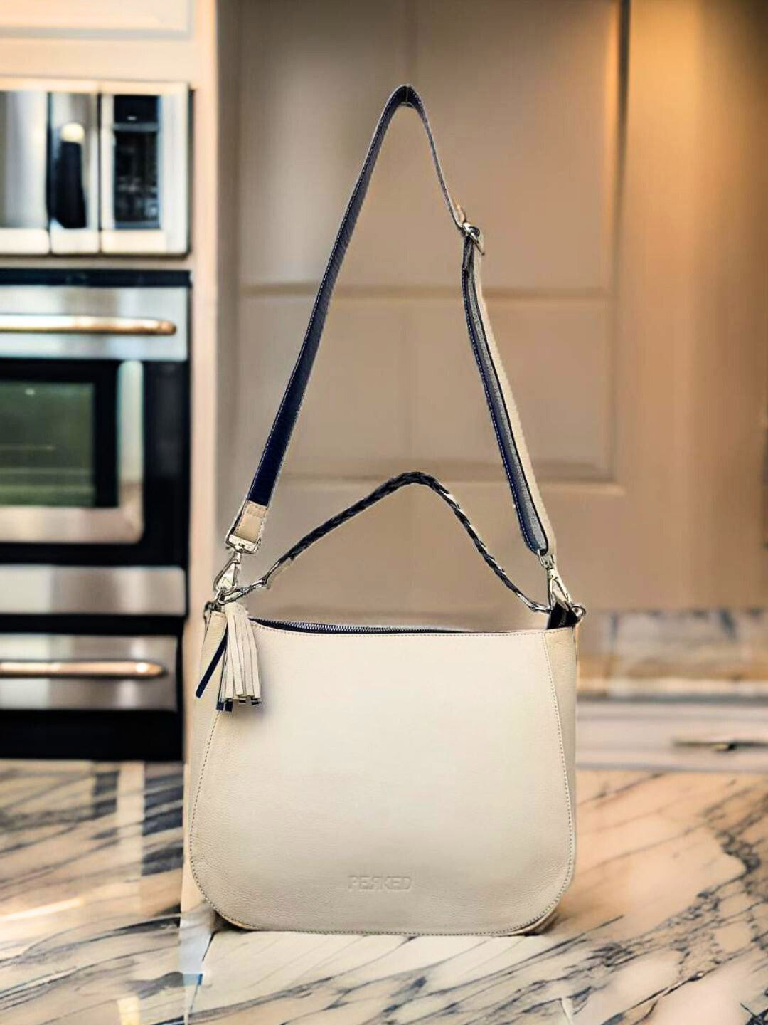 Buy PERKED Women Solid Structured Leather Handheld Bag - Handbags for ...