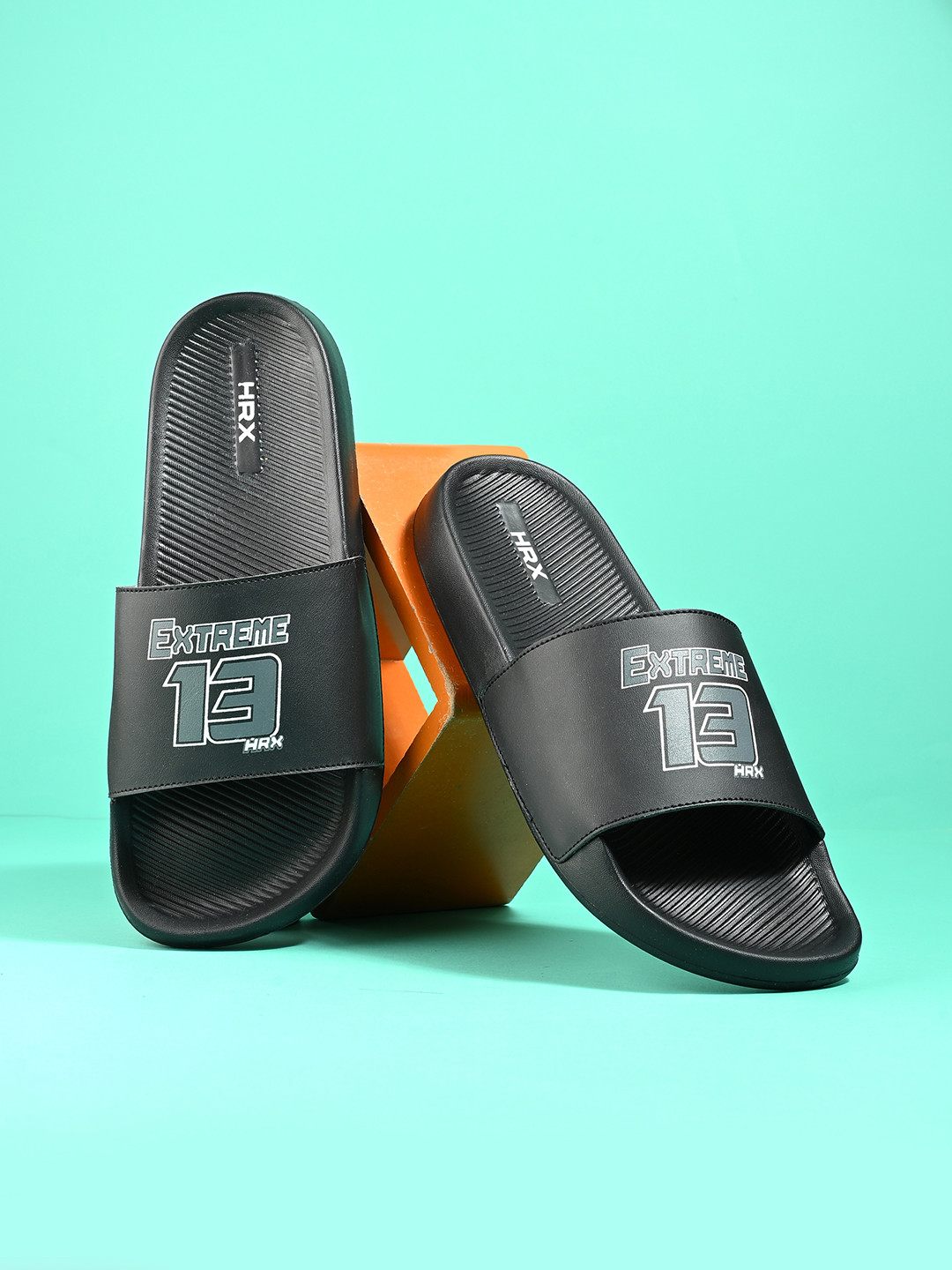 Buy HRX By Hrithik Roshan Men Printed Sliders - Flip Flops for Men ...