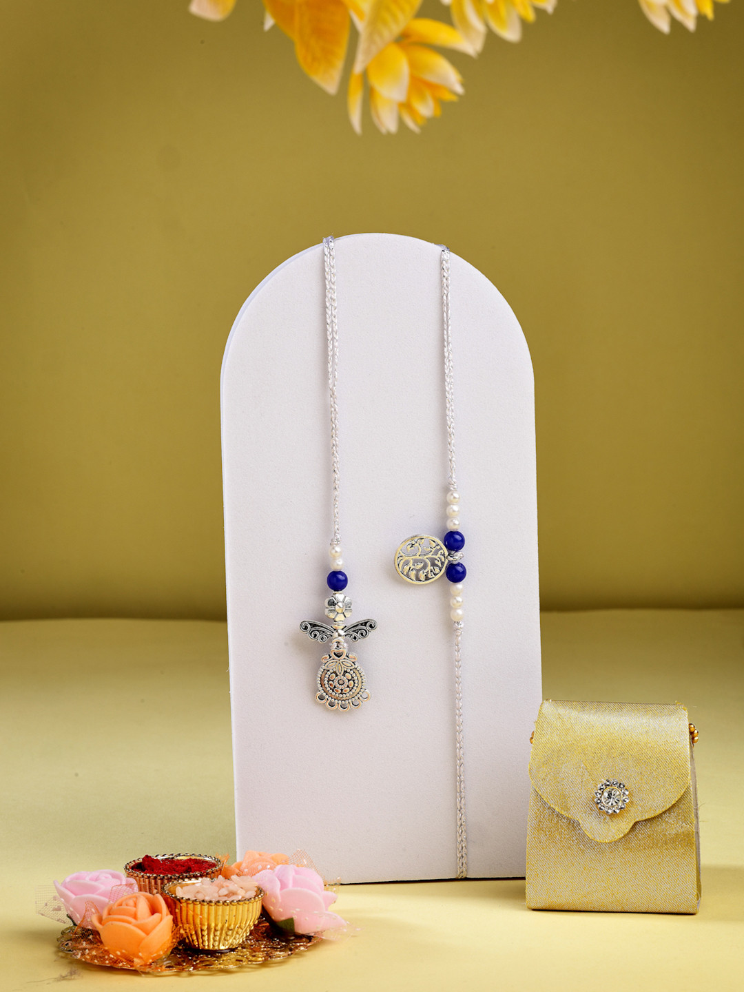 Buy ADIVA Unisex Set Of 2 Silver Plated Beaded Lumba Rakhi With Pooja ...