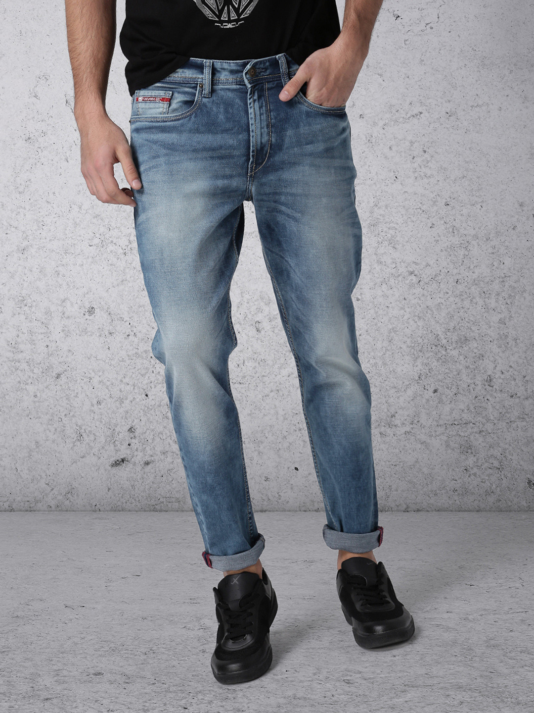 Buy Ecko Unltd Men Blue Tapered Fit Mid Rise Clean Look Stretchable ...