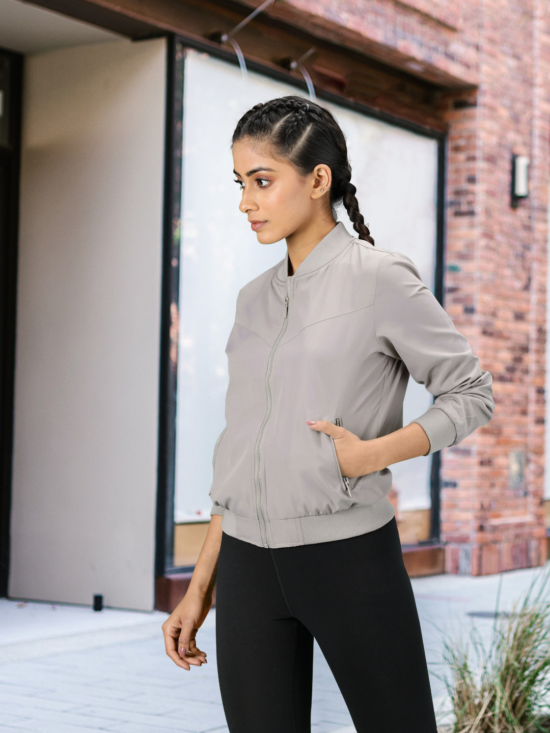 Buy HRX By Hrithik Roshan Women Grey Solid Bomber Outdoor Jacket ...