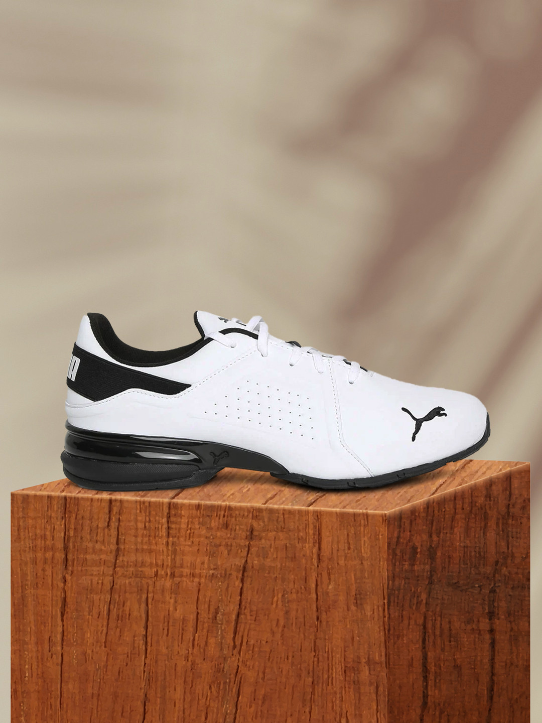Buy Puma Men White Running Shoes - Sports Shoes for Men 6703466 | Myntra