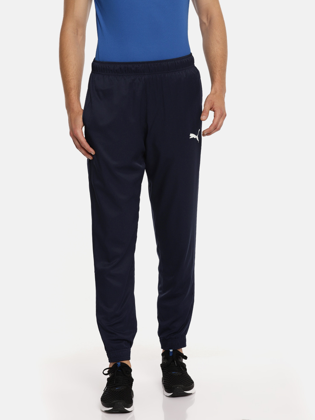 Buy Puma Men Navy Solid ESS Active Woven Cl Regular Fit Track Pants ...