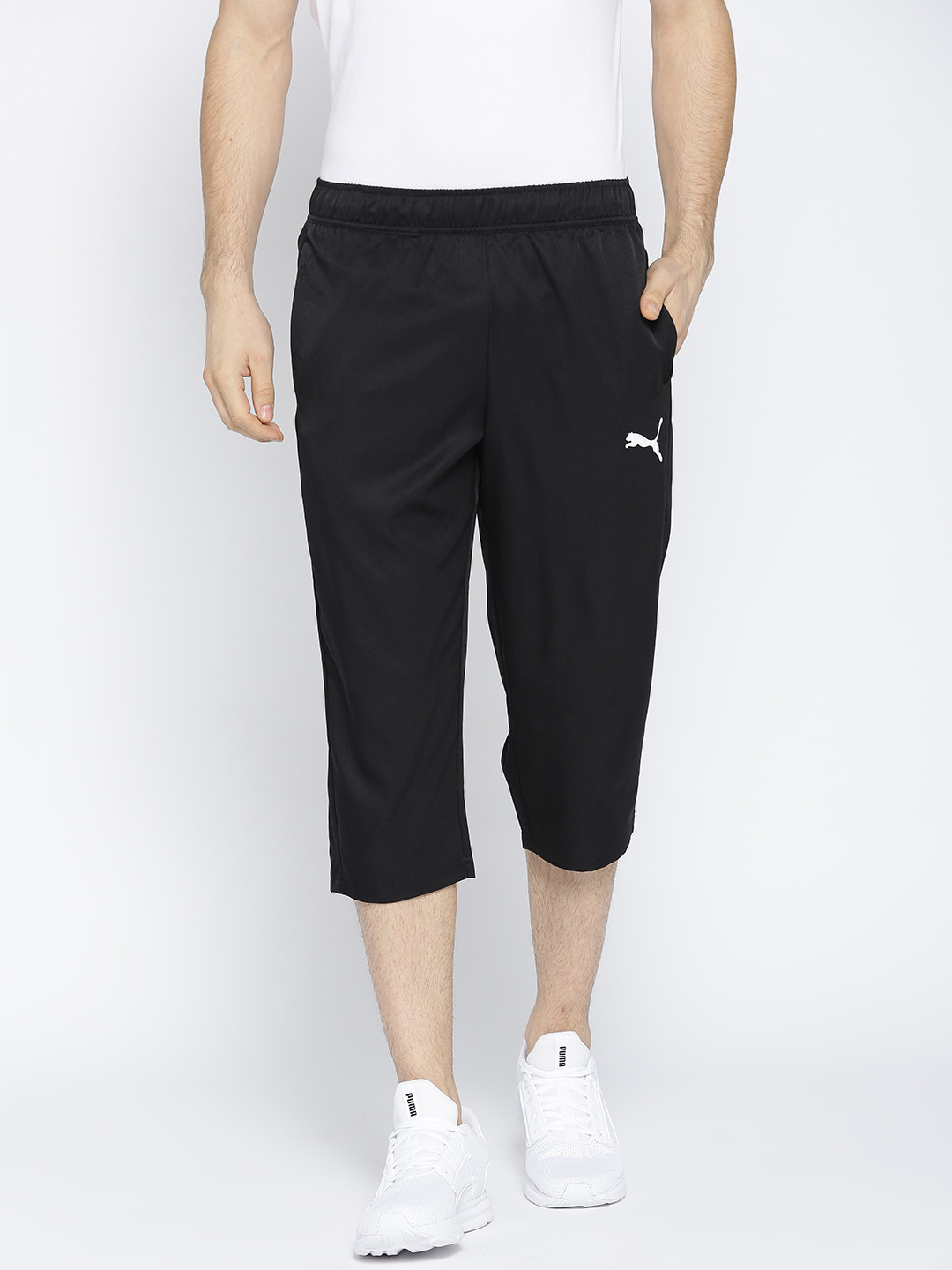 Buy Puma Men Black Solid ESS Active Woven 3/4 Pants - Shorts for Men ...