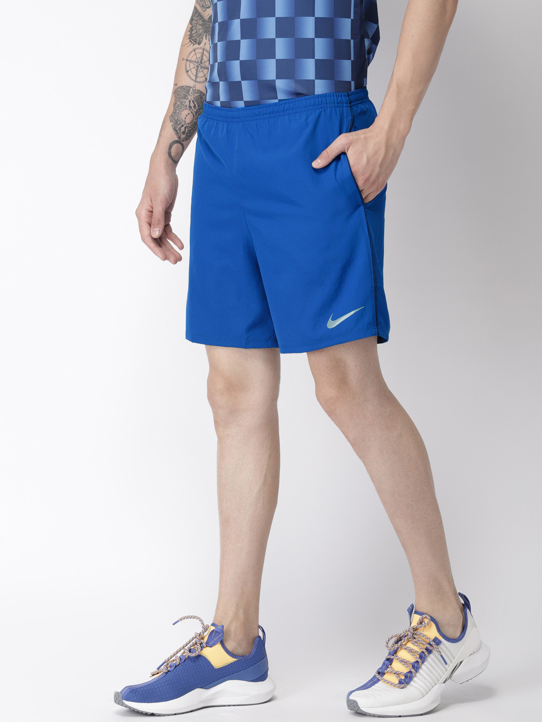 Buy Nike Men Blue Solid Standard Fit AS M 7IN DRI FIT Running Shorts ...